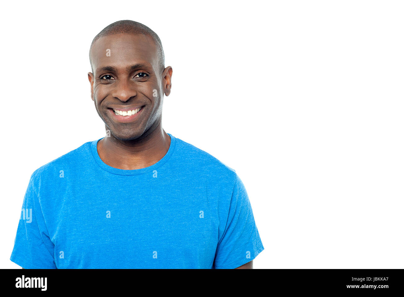 Smiling guy isolated over white background Stock Photo - Alamy