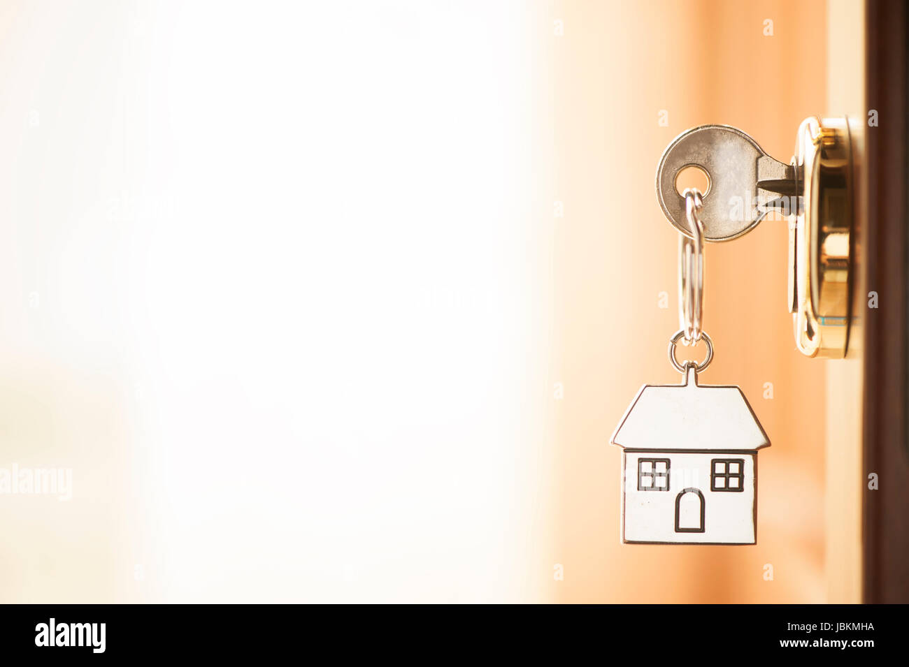 House key in the door Stock Photo - Alamy