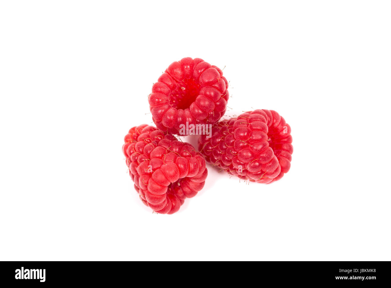 ripe red raspberry isolated on white background Stock Photo - Alamy