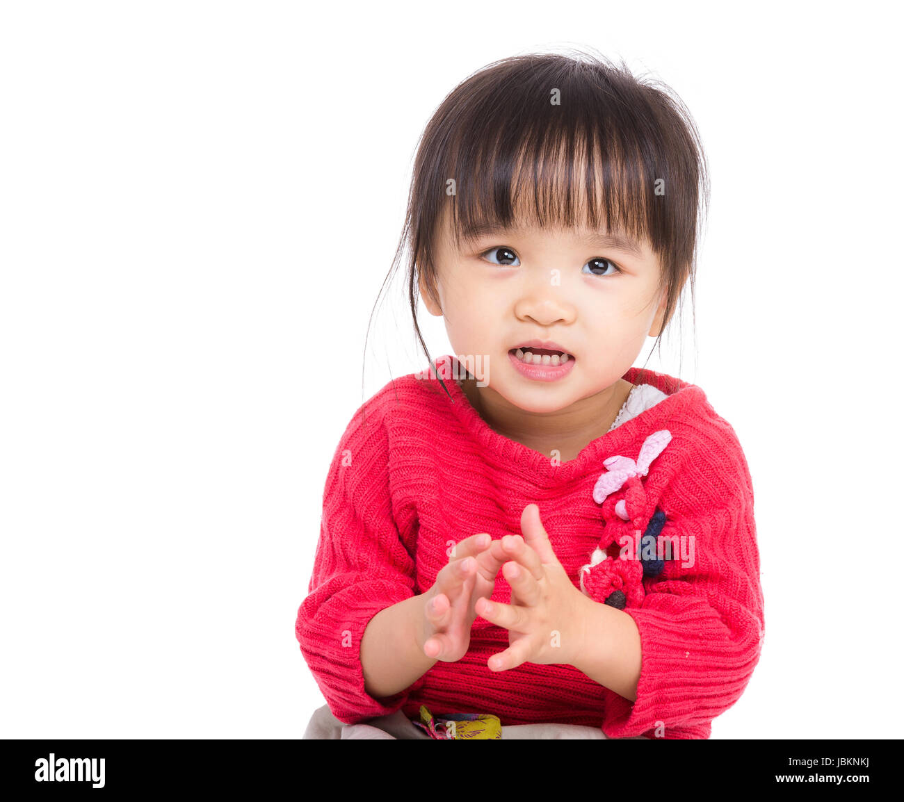 Asia little girl clapping hand Stock Photo - Alamy