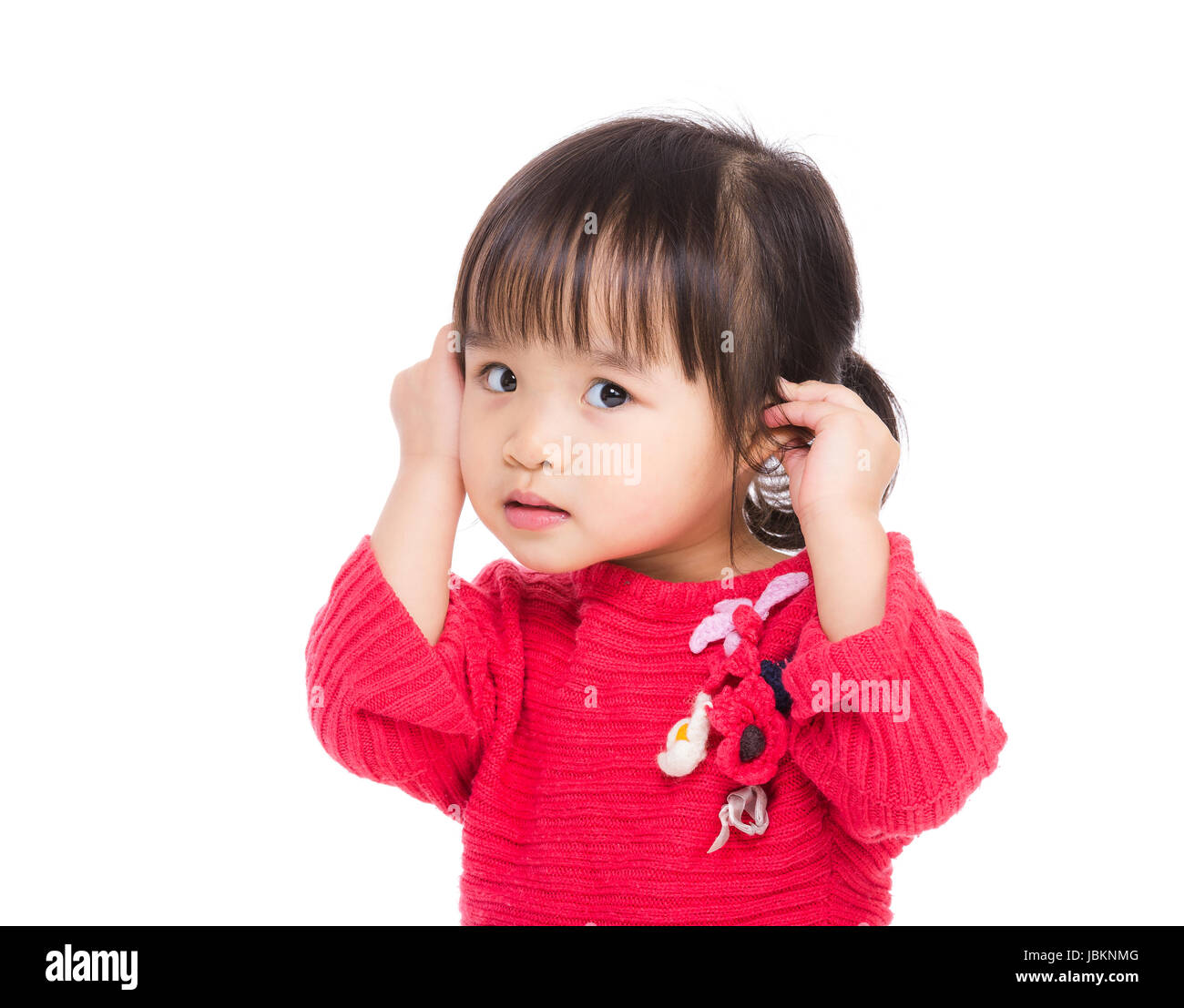 Asia little girl touch her ear Stock Photo - Alamy