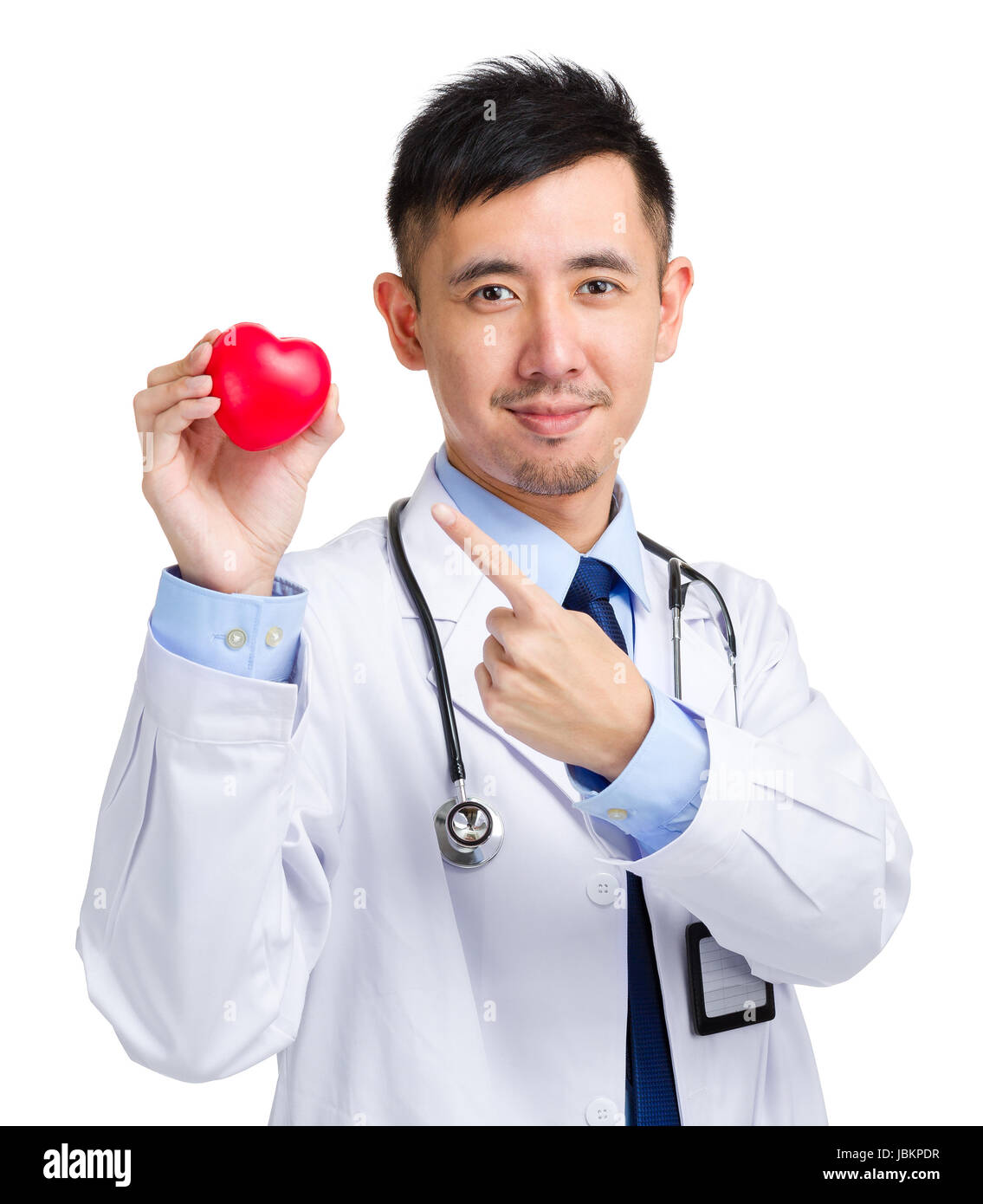 Medical doctor holding heart squeezing ball Stock Photo - Alamy