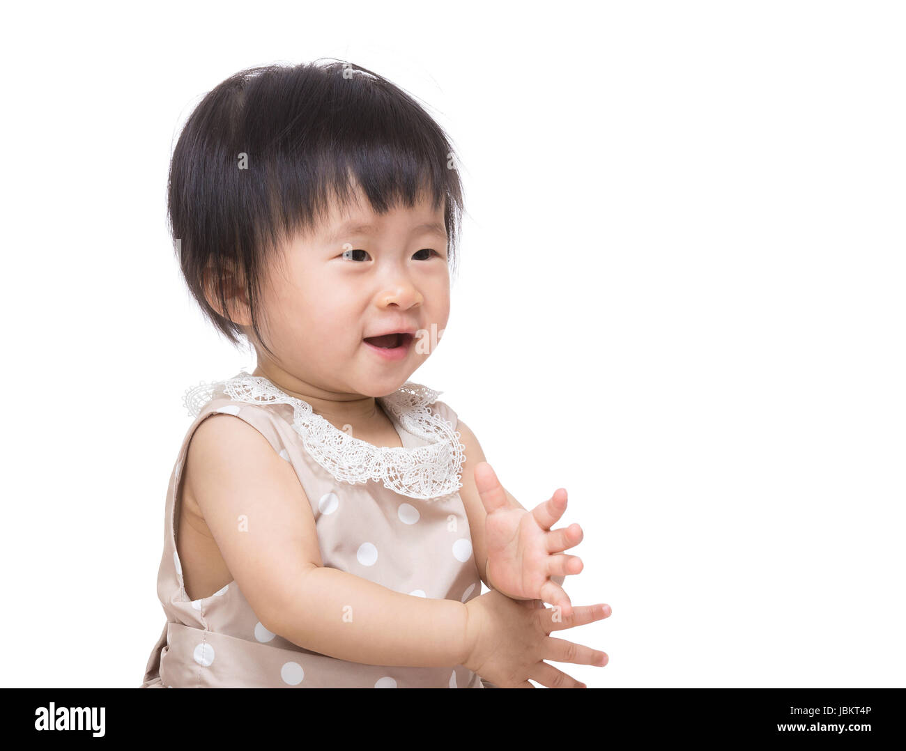 Asian baby girl clapping hand Stock Photo - Alamy