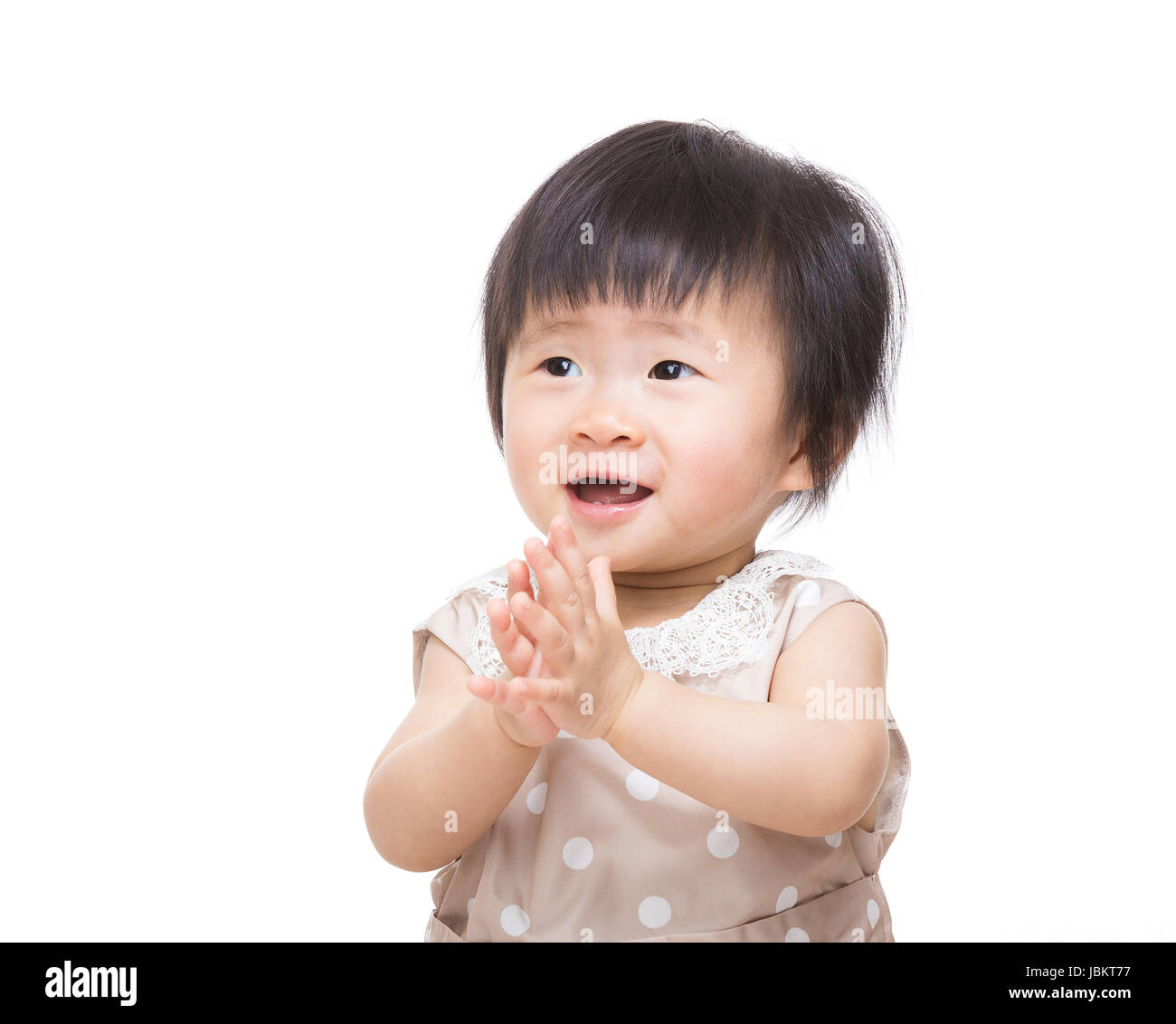 Excited baby girl clapping hand Stock Photo - Alamy