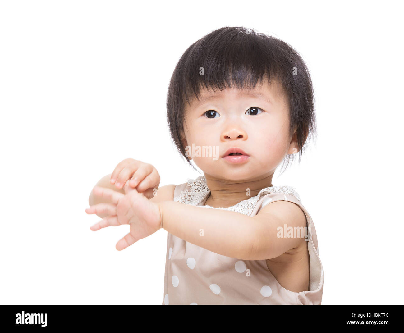 Baby touch her hand Stock Photo - Alamy