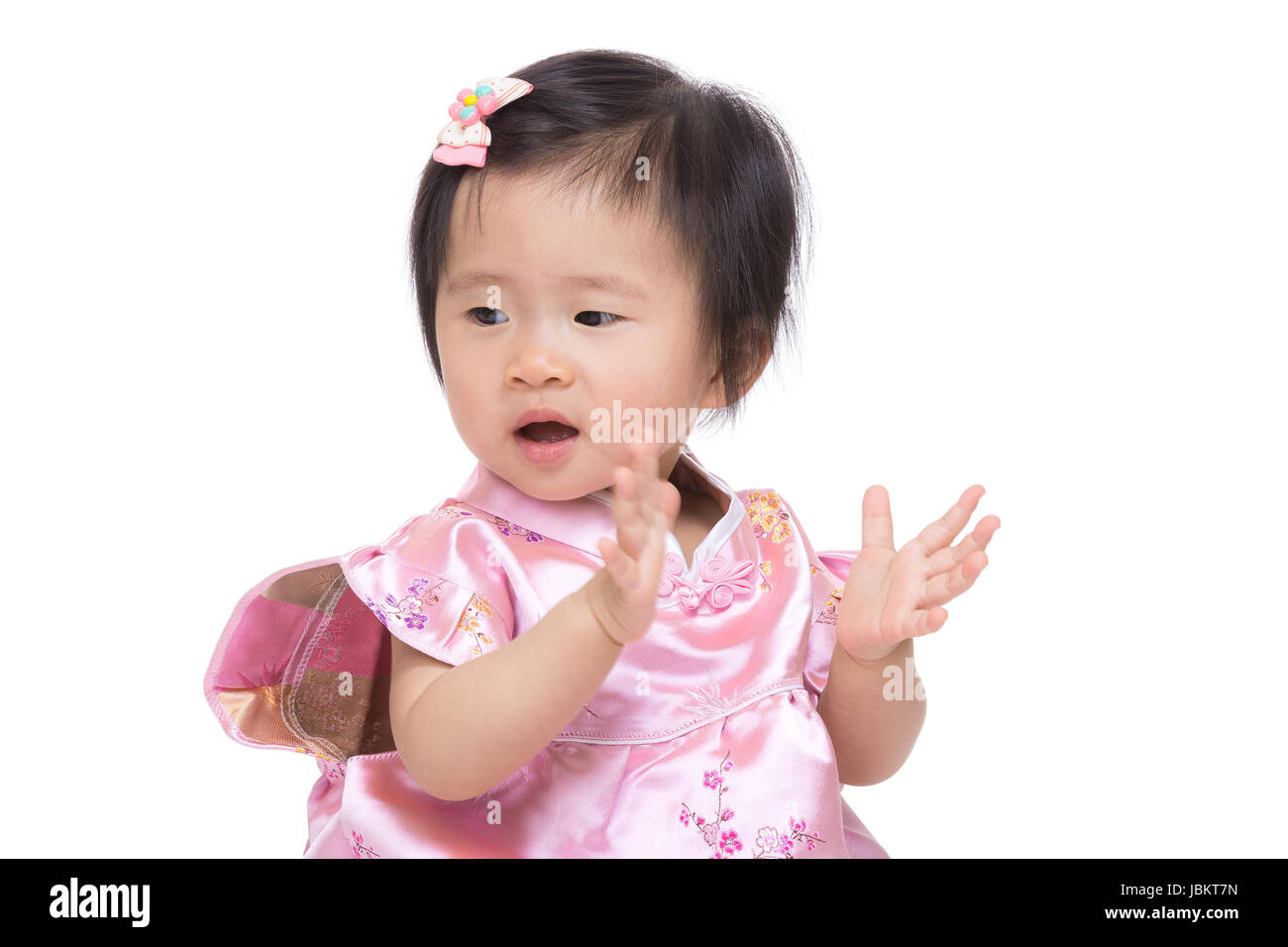 Chinese baby girl clapping hand Stock Photo - Alamy