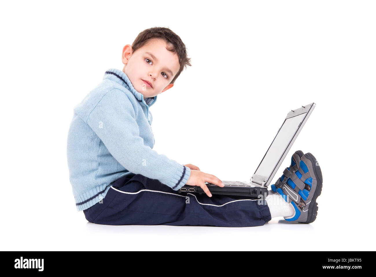 Kids laughing computer Cut Out Stock Images & Pictures - Alamy
