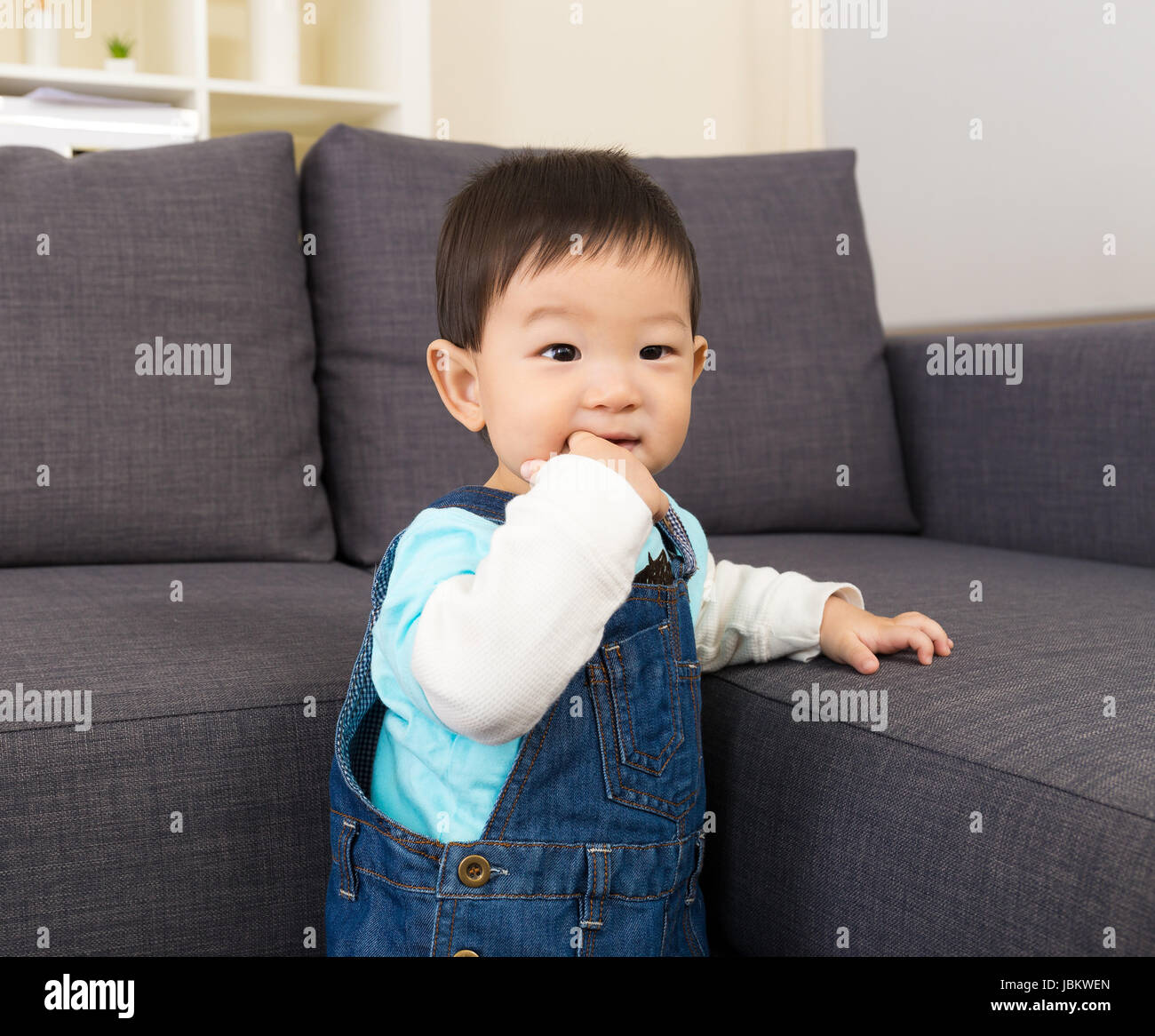 Baby boy suck finger Stock Photo - Alamy