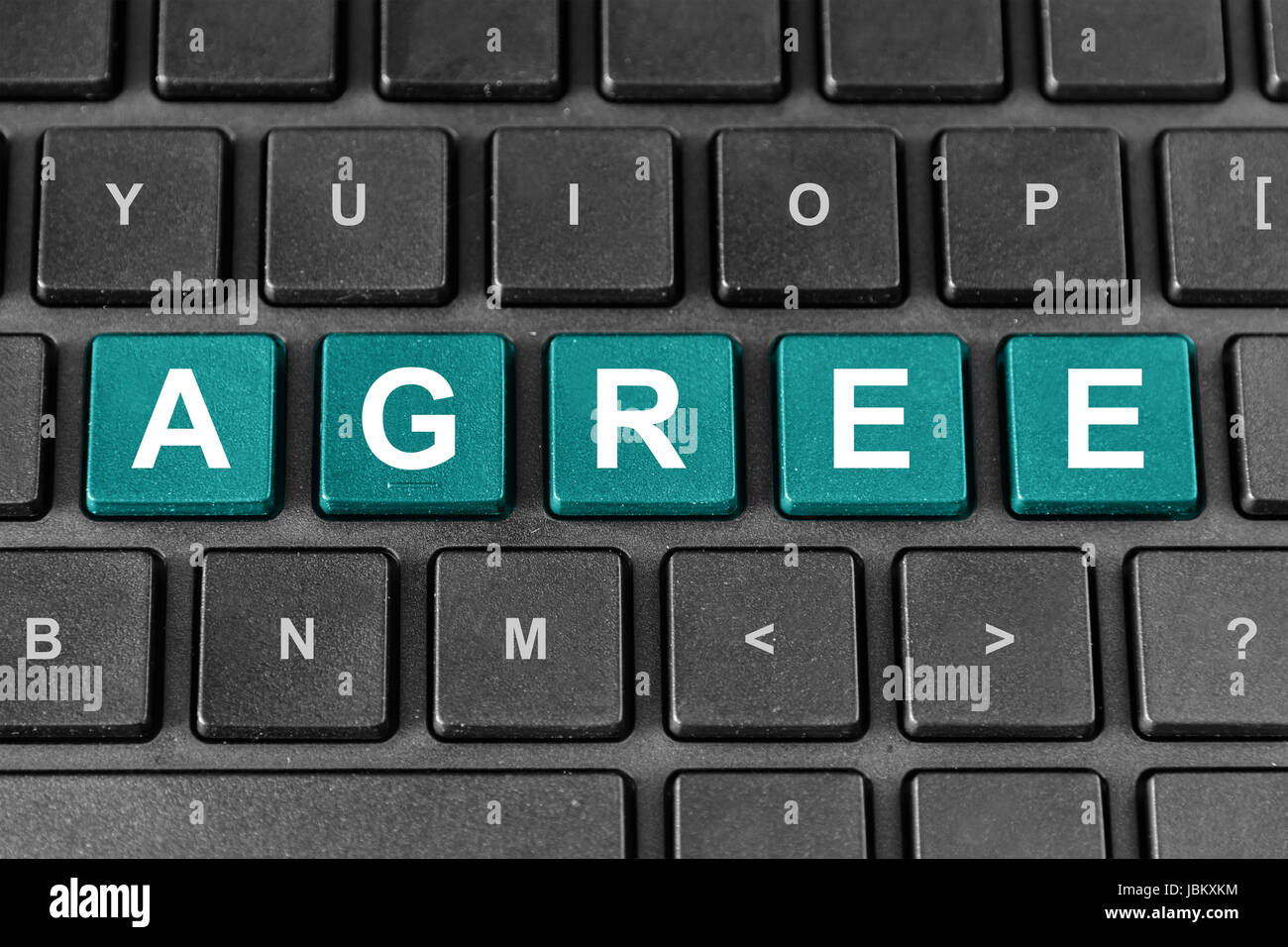 agree turquoise word on keyboard Stock Photo - Alamy
