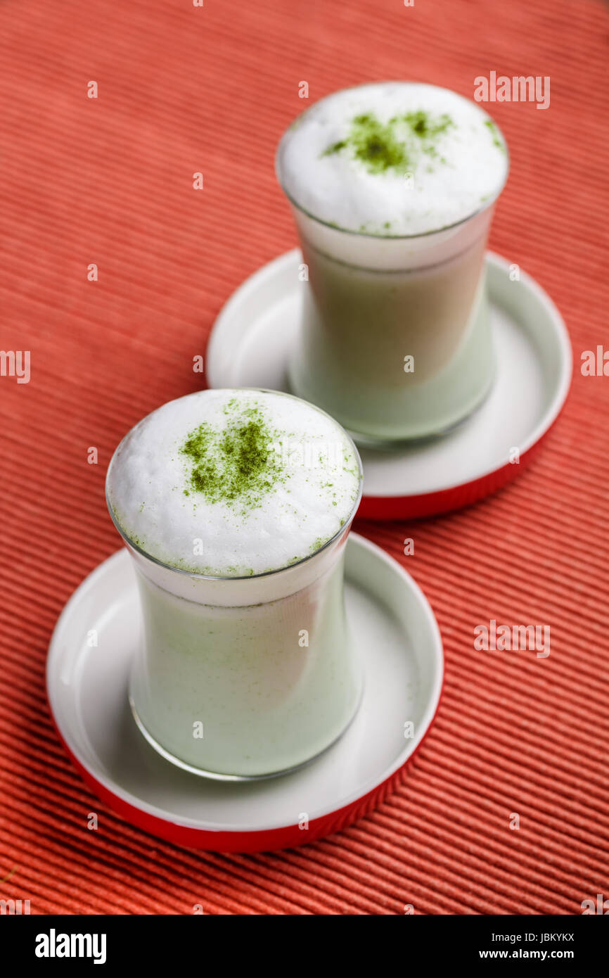 Hot matcha green tea latte glass Stock Photo - Alamy