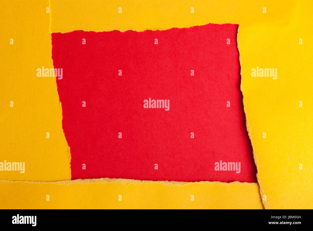 A Yellow Frame on a Red Square, Paper Background Stock Photo - Alamy