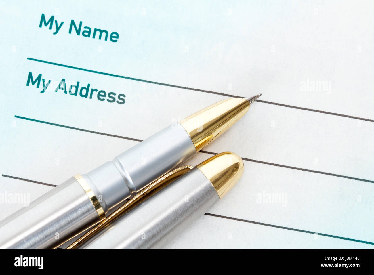 Filling the name and address in an application form Stock Photo - Alamy
