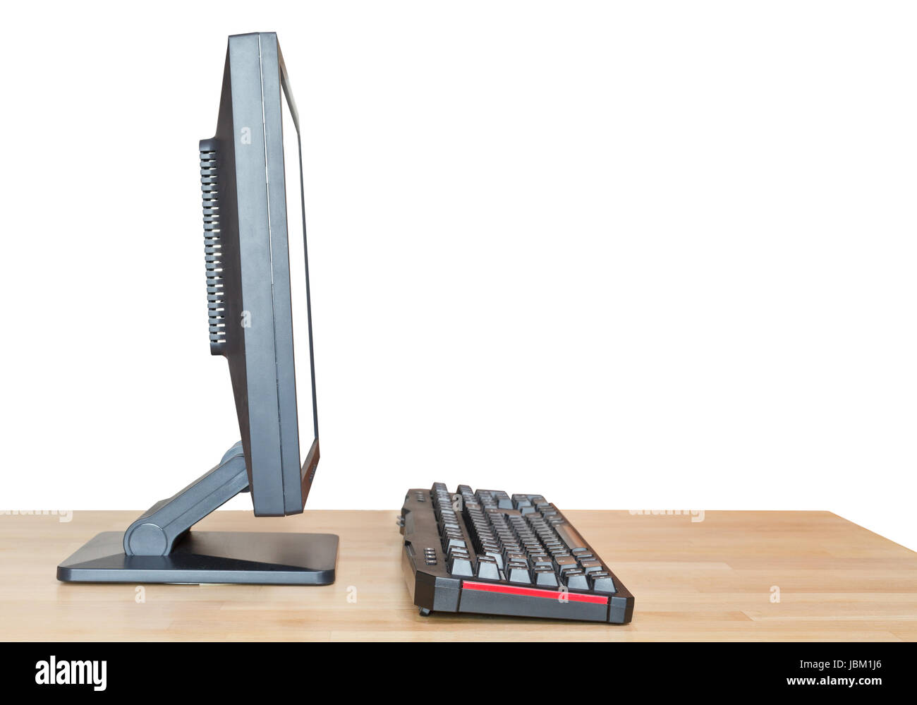 side view of computer display with cut out screen and keyboard on ...