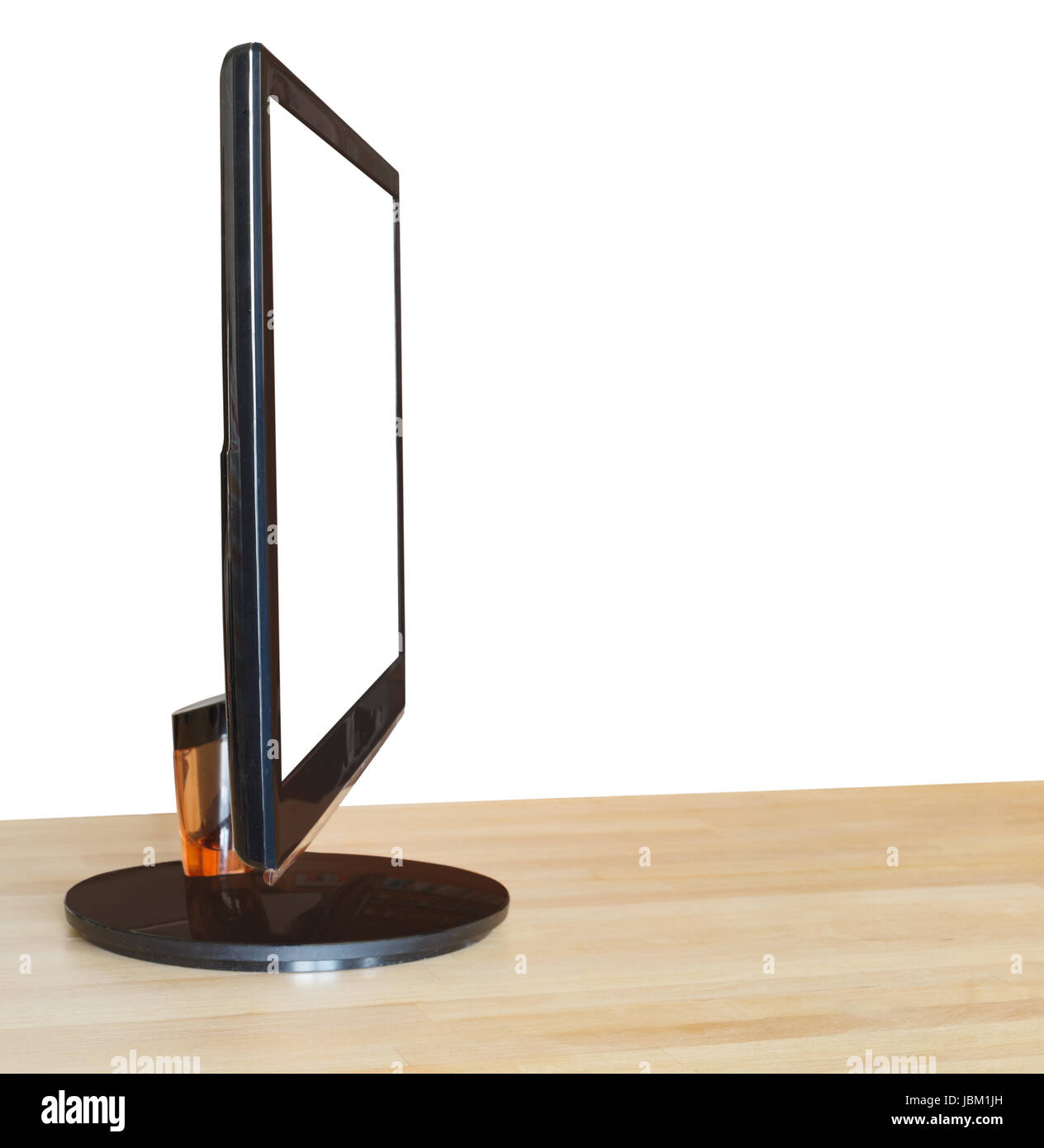 side view of computer widescreen display with cut out screen on wood ...