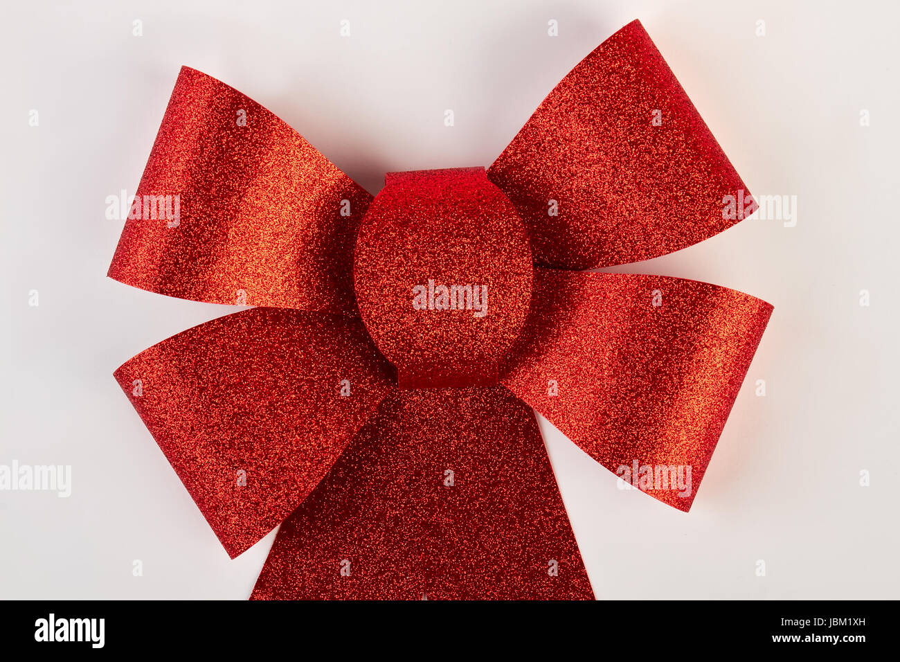 Red shiny bow isolated Stock Photo - Alamy