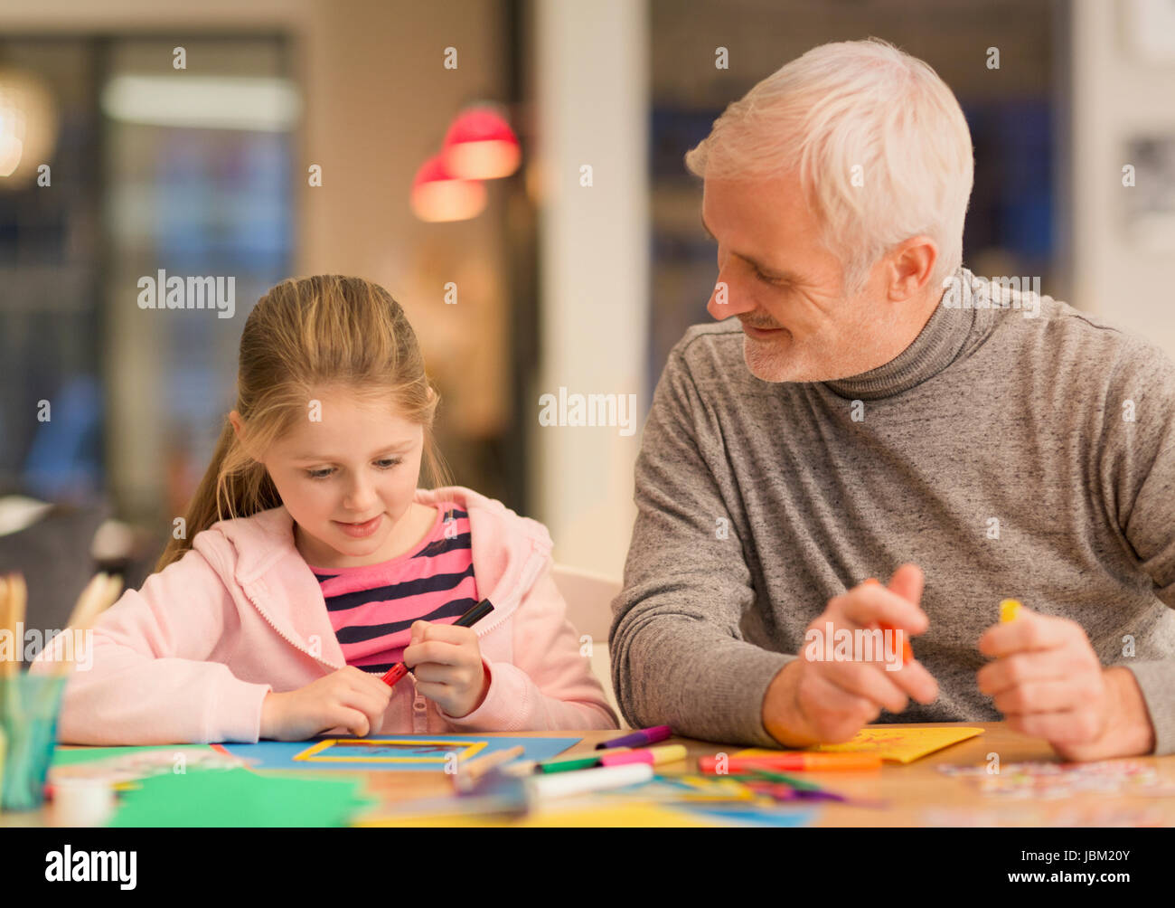 Father and daughter bonding, doing crafts at table Stock Photo - Alamy