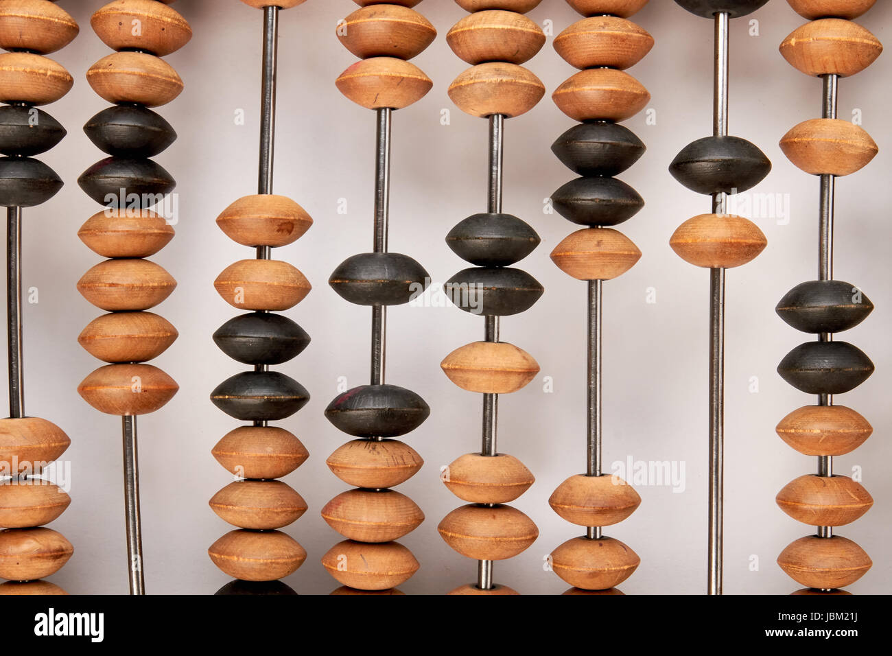 Closeup wooden abacus, white background Stock Photo - Alamy