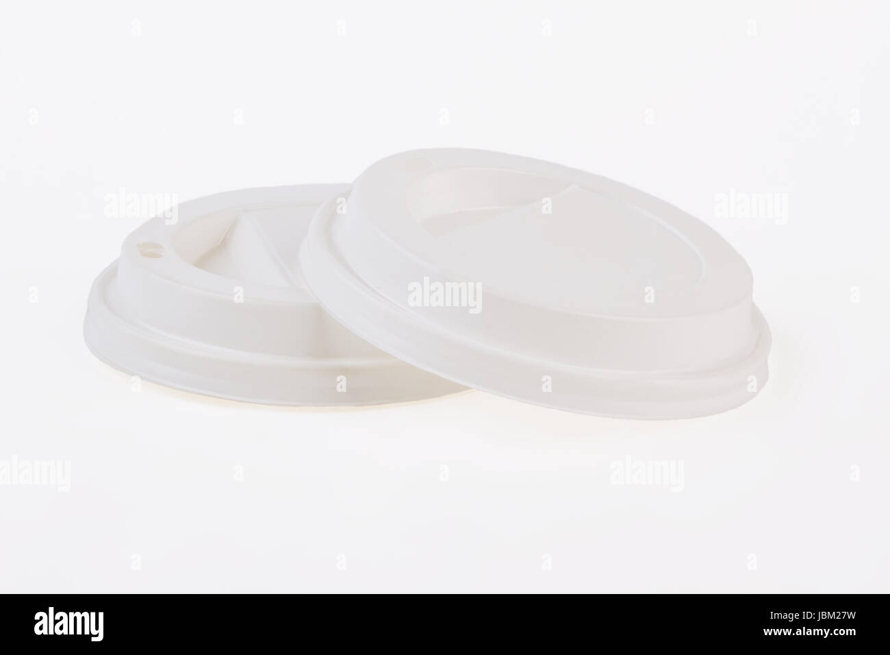 Plastic disposable coffee caps isolated Stock Photo - Alamy