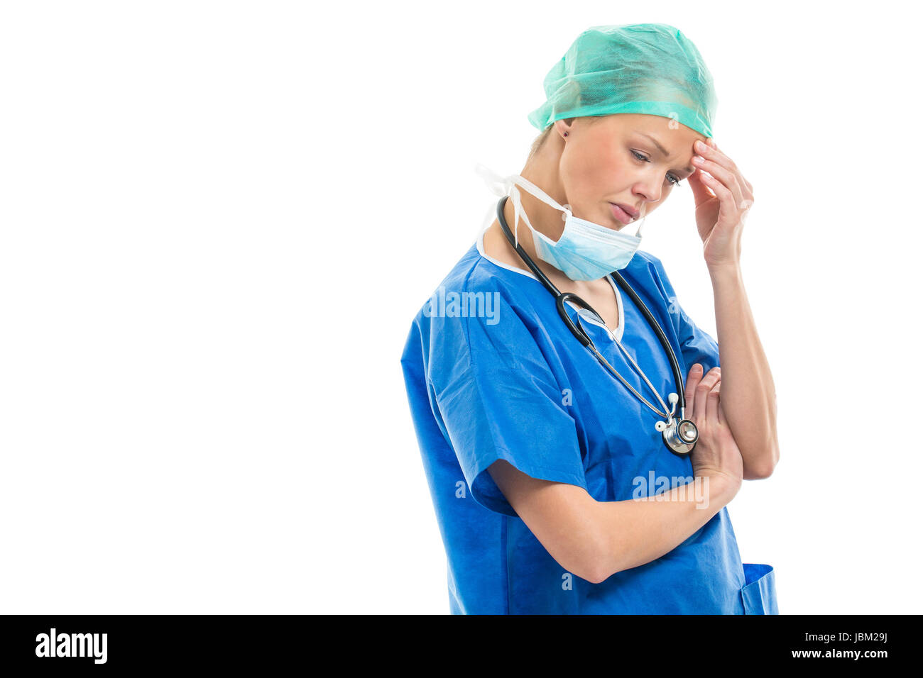 Portrait of a female doctor/surgeon feeling down, exhausted, frustrated ...