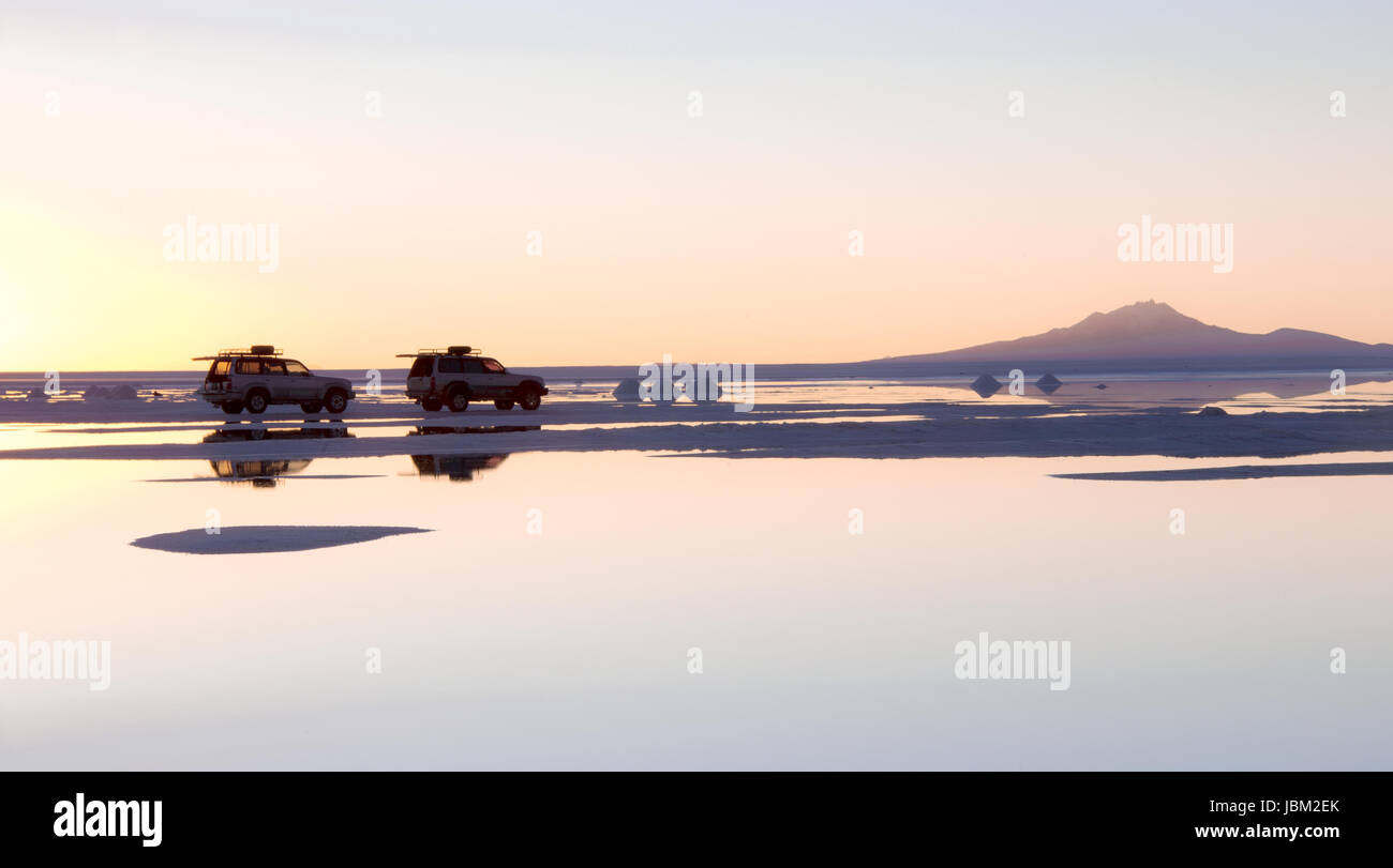 SALAR DE UYUNI, BOLIVIA - JULY 24: The car on the salt lake of Uyuni ...