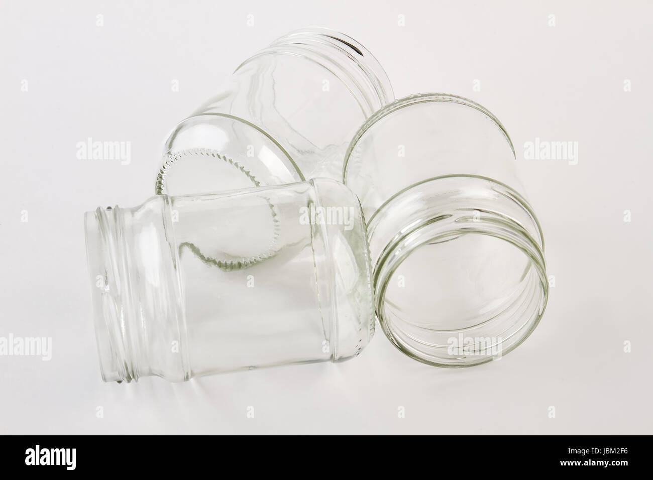 Three jars isolated on white Stock Photo - Alamy
