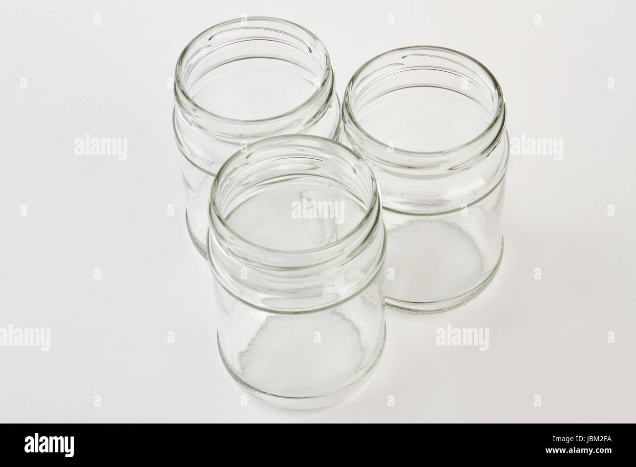 Transparent household containers, white background Stock Photo - Alamy