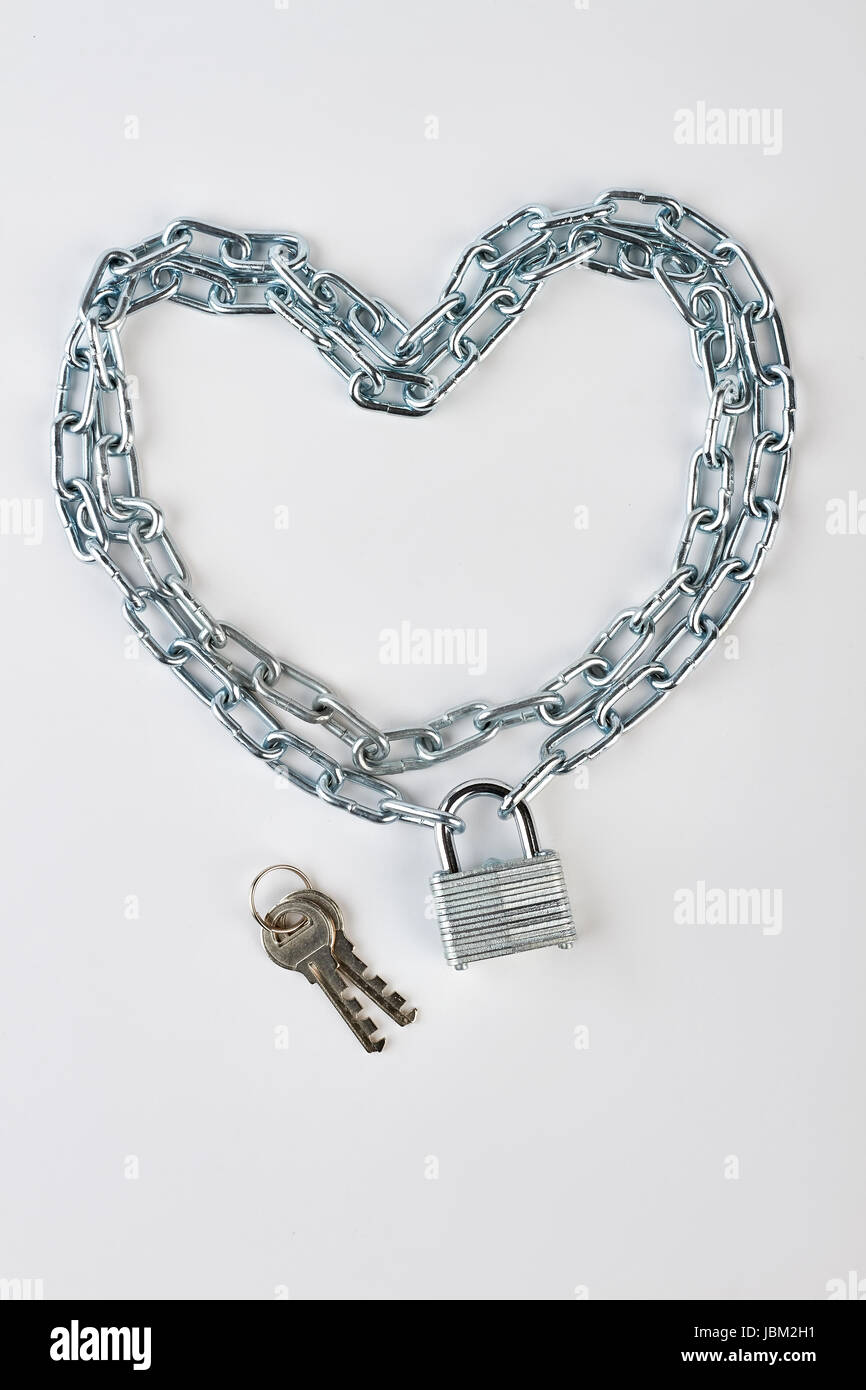 Chain in shape of heart Stock Photo - Alamy