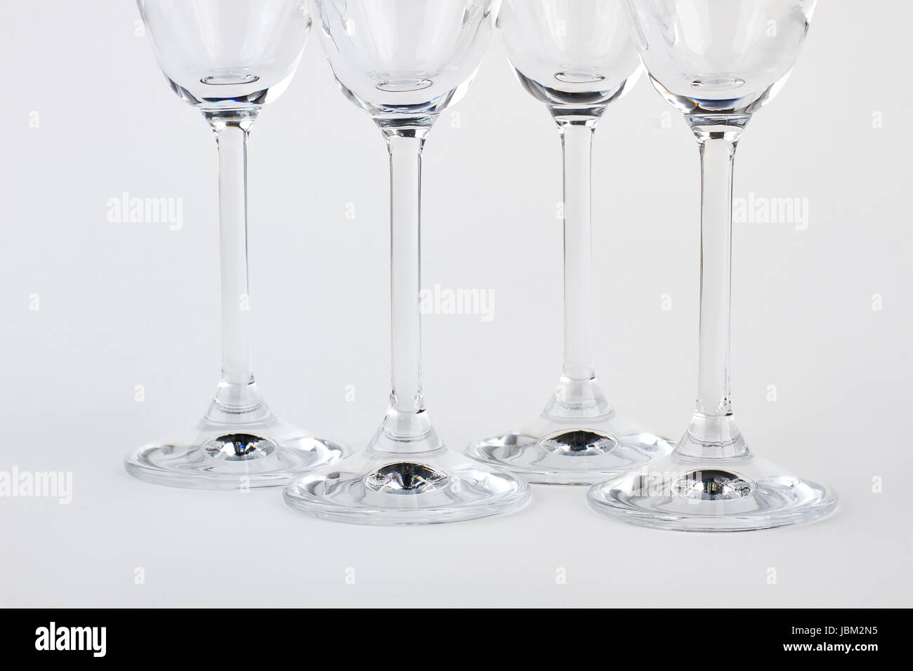 Closeup four champagne goblets Stock Photo - Alamy