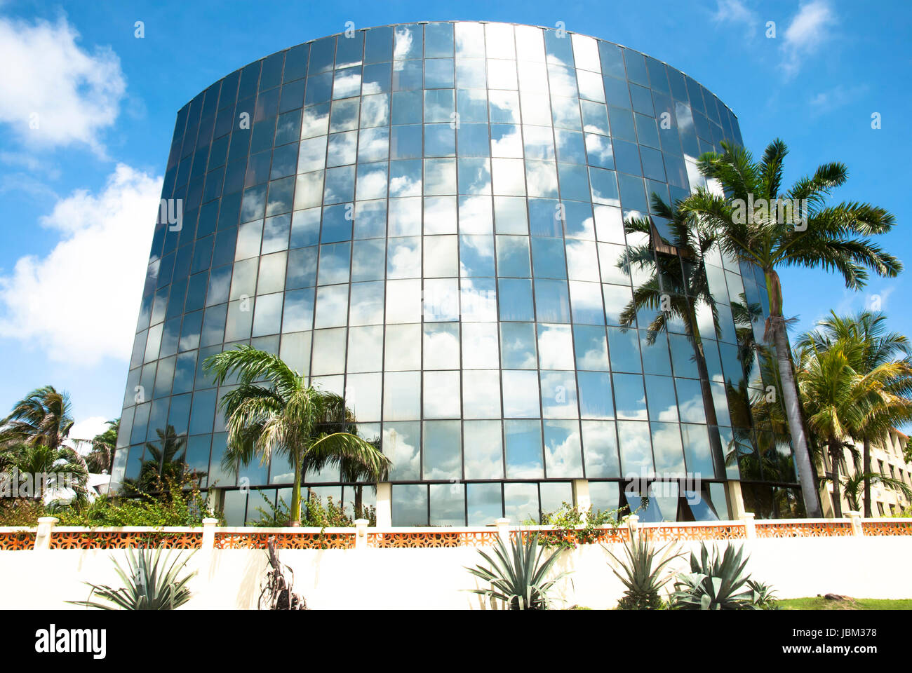 Modern building covered in glass in Belize City (Belize Stock Photo - Alamy