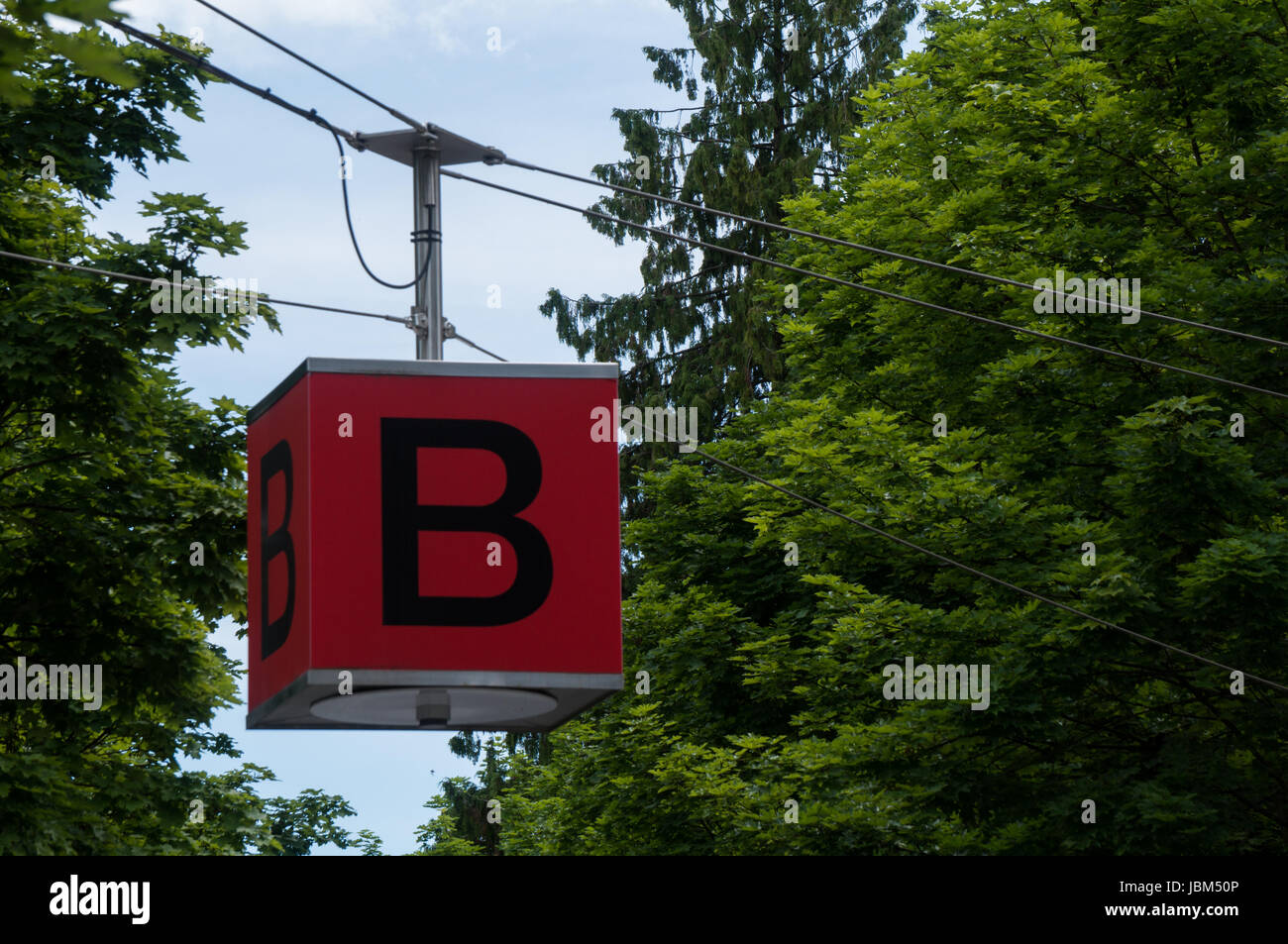 The letter "B" suspended on cables Stock Photo - Alamy
