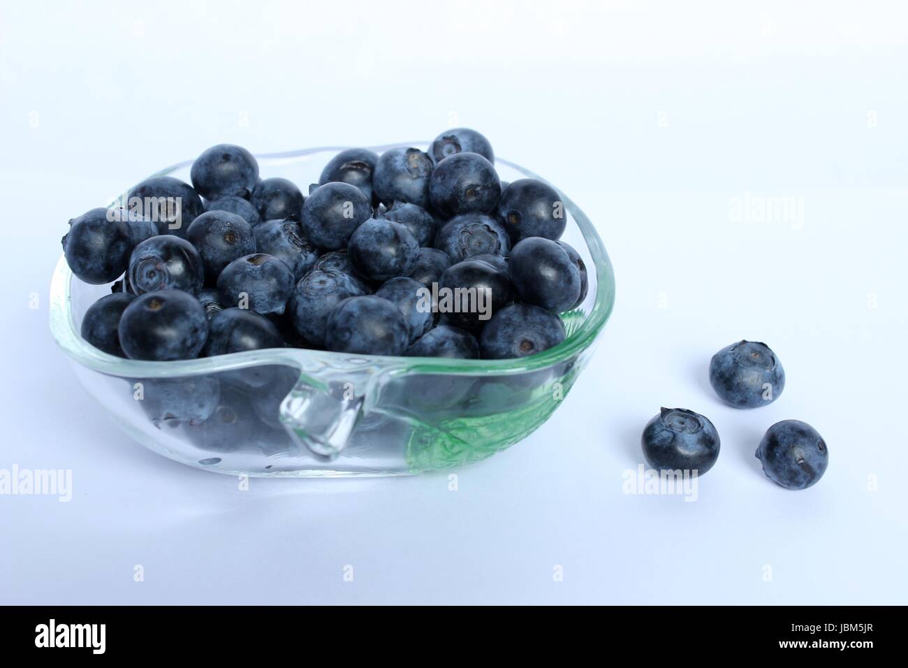 A delicious portion of blueberry and full of vitamins on a white ...