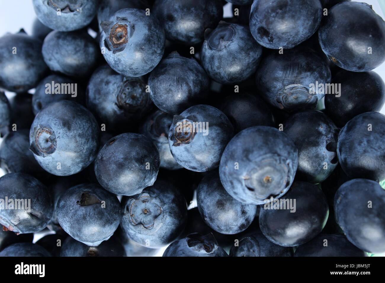 A delicious portion of blueberry and full of vitamins on a white ...