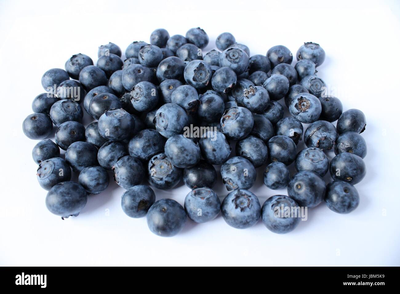 A delicious portion of blueberry and full of vitamins on a white ...