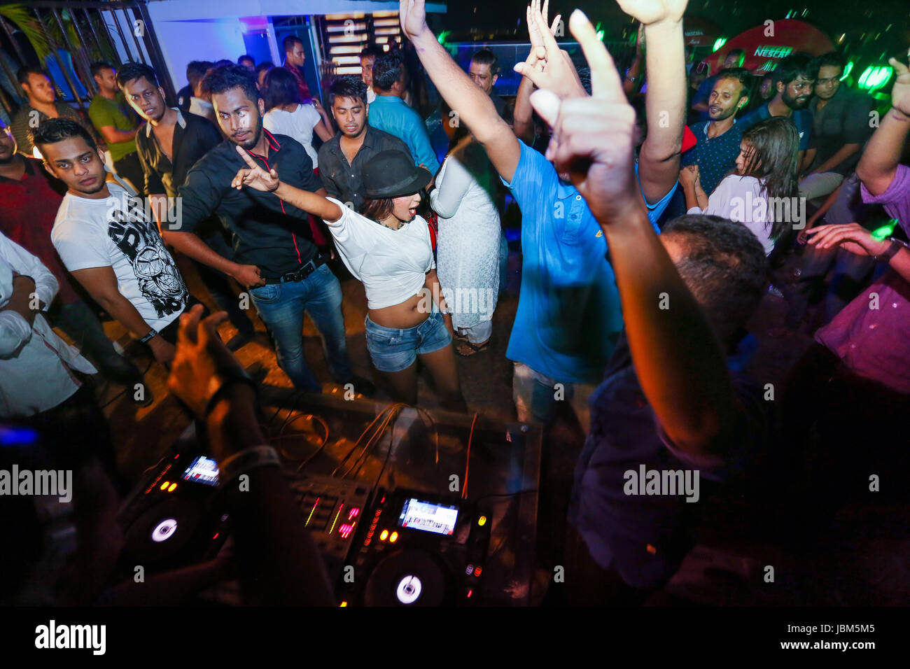 People dancing and enjoying DJ Party at Picasso Restaurant in Dhaka ...