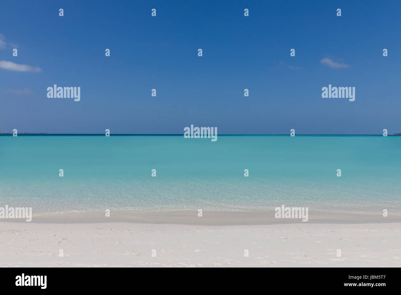 Seascape view blue tropical ocean under sunny blue sky Stock Photo - Alamy