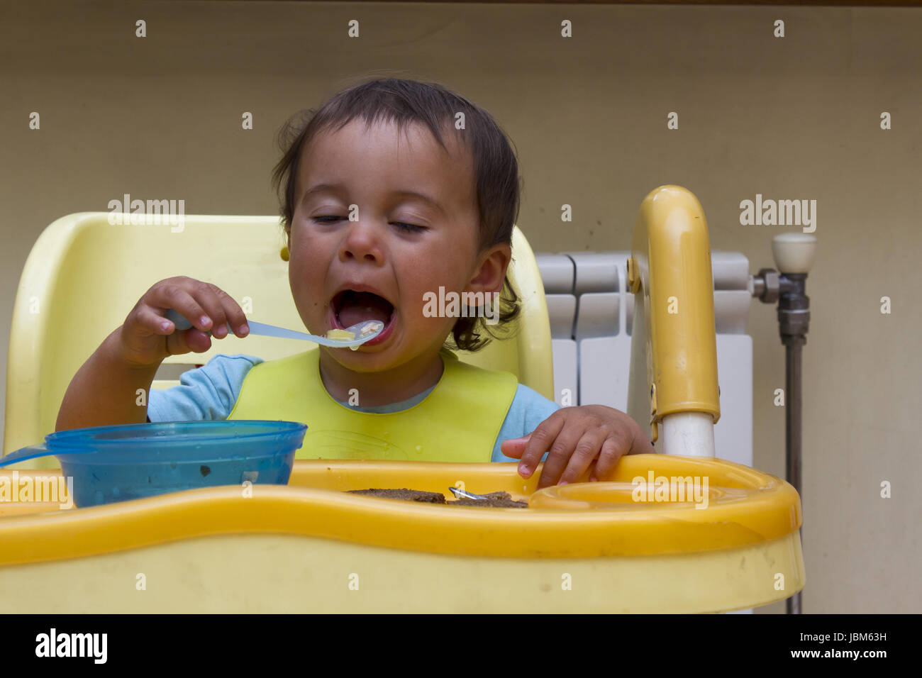 Young boy eating soup hi-res stock photography and images - Alamy