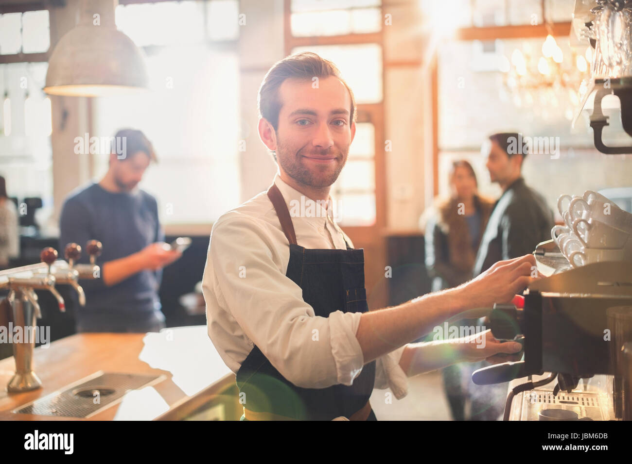Portrait happy barista man hi-res stock photography and images - Alamy