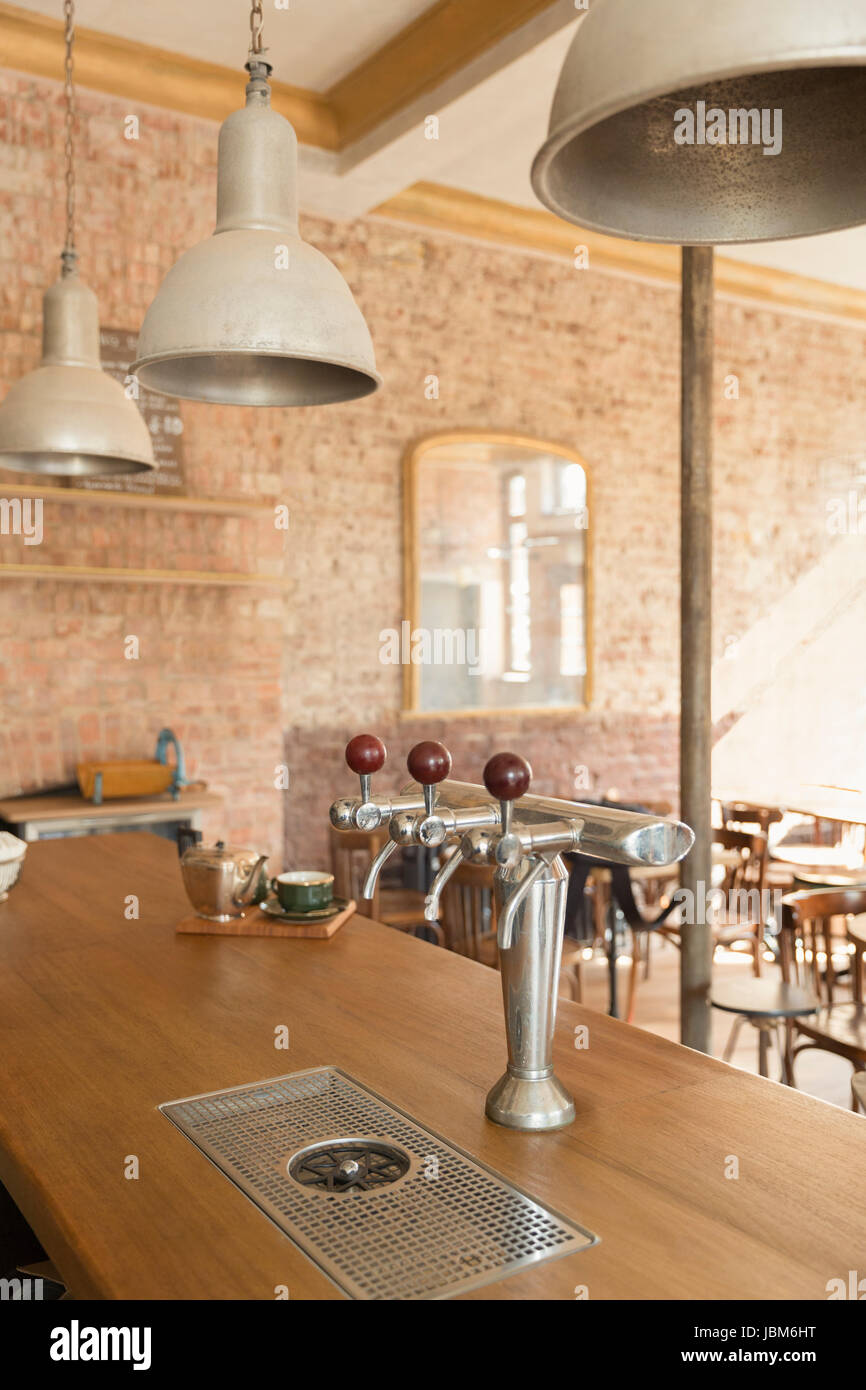 Empty bar with bar taps Stock Photo - Alamy