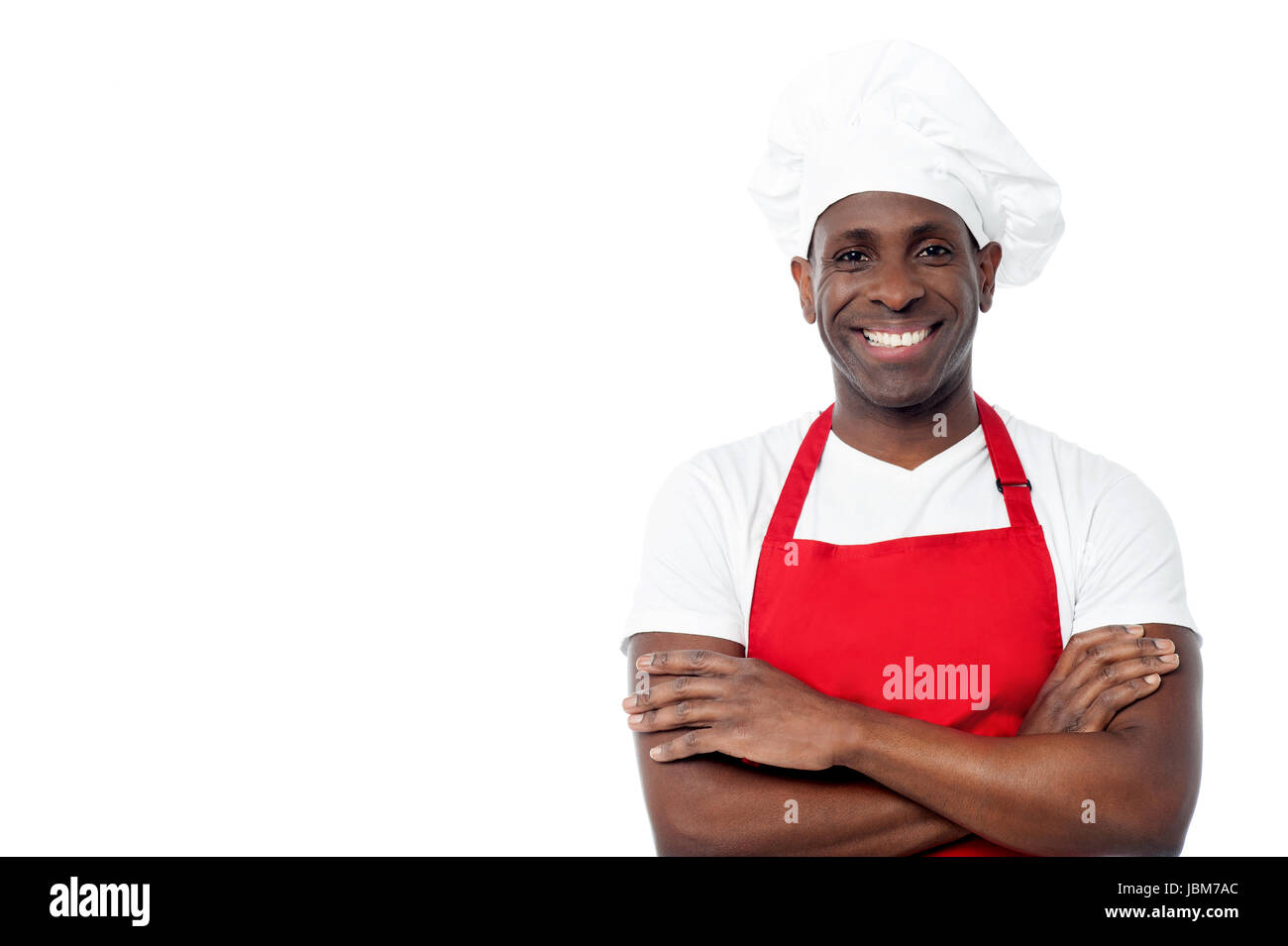 Confident middle aged chef with arms crossed Stock Photo - Alamy