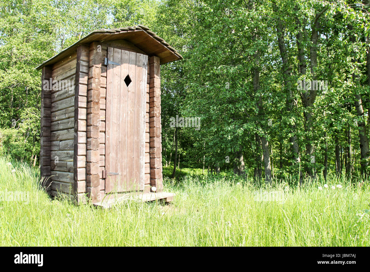 Old wooden outhouse for tourists at a forest Stock Photo - Alamy