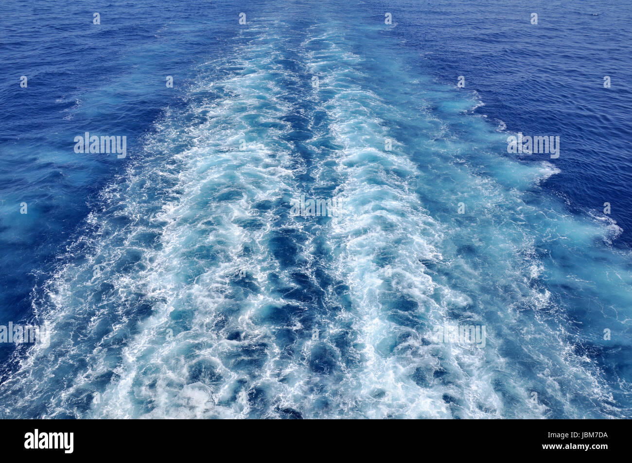 Stern wave of a cruise ship at full speed Stock Photo - Alamy