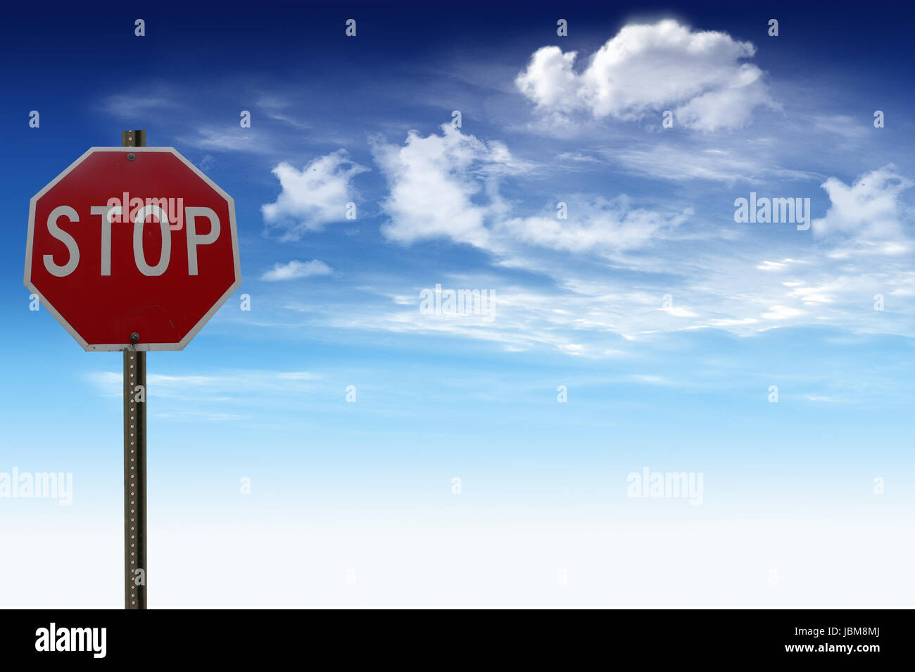 Stop traffic signal with blue sky and clouds in the background Stock ...