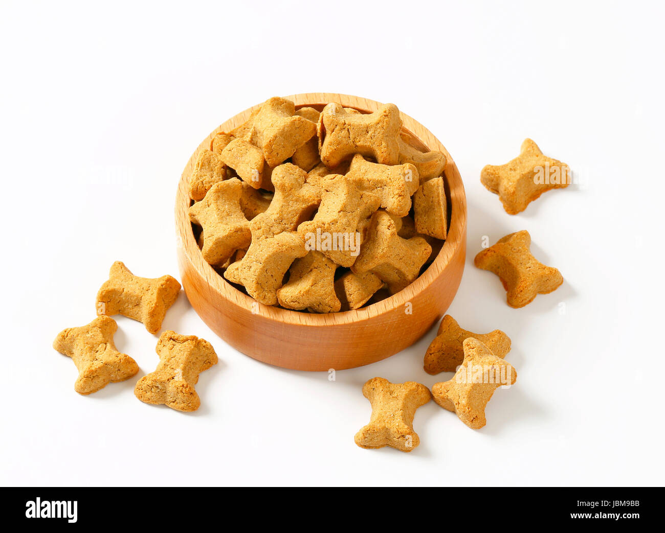 Small bone-shaped treats for dogs Stock Photo - Alamy