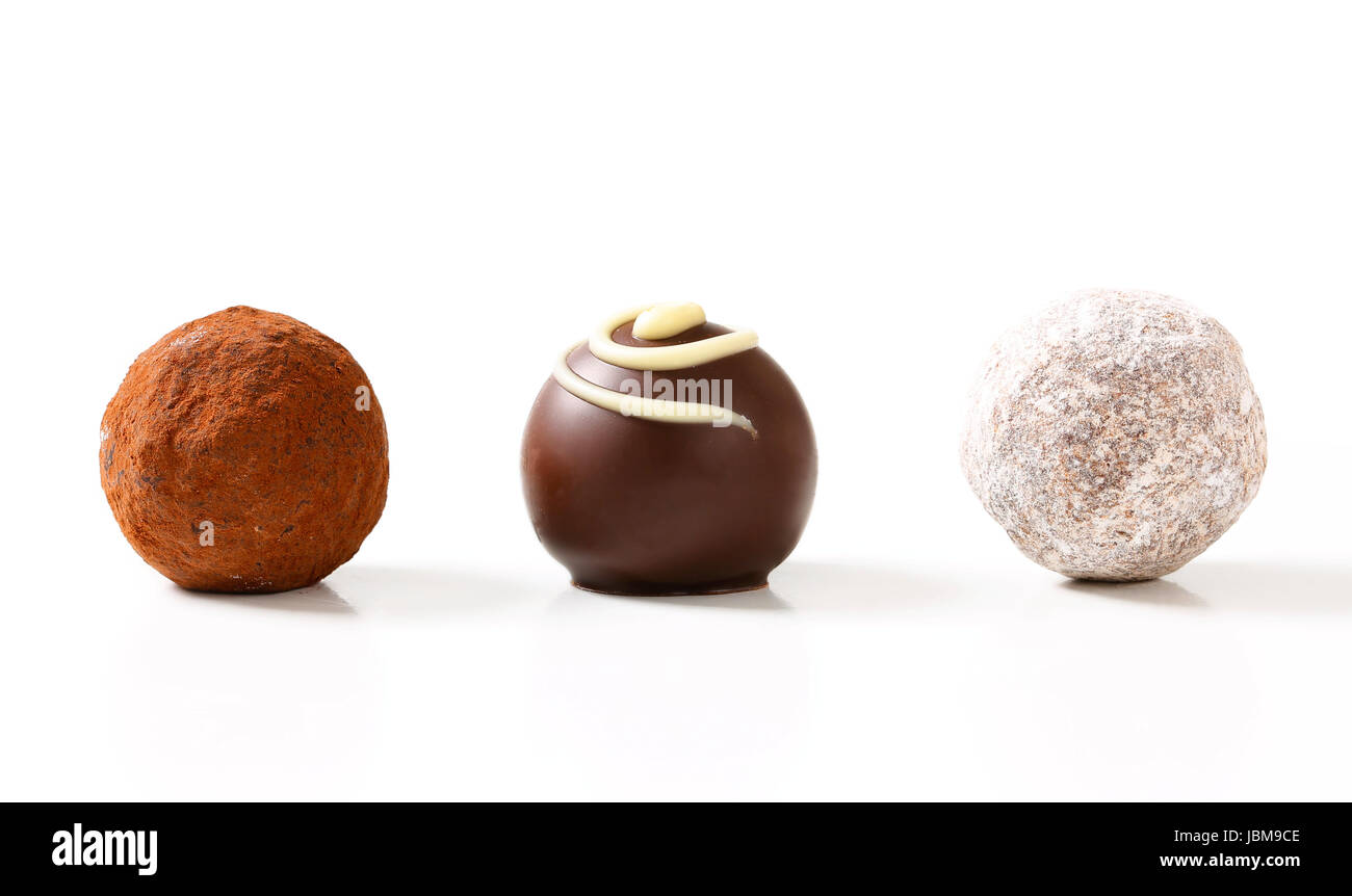 Assorted chocolate truffles and pralines with ganache filling Stock ...