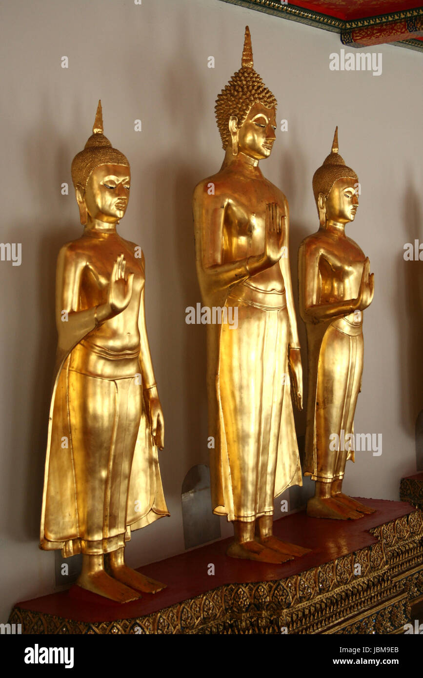 golden buddha statues Stock Photo - Alamy