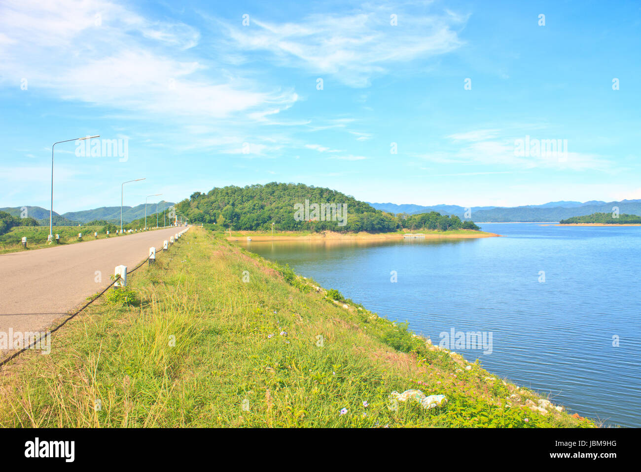 asphalt road and blue sky on top of DAM Stock Photo - Alamy