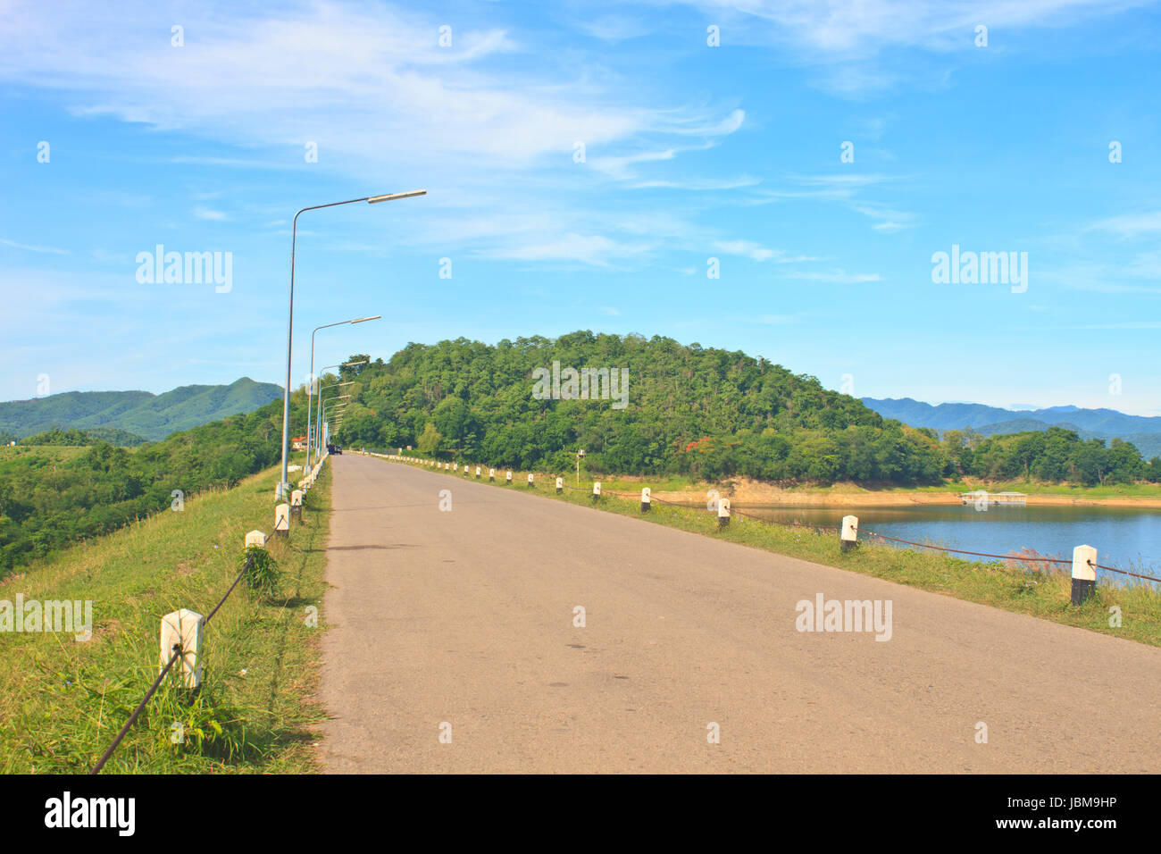 asphalt road and blue sky on top of DAM Stock Photo - Alamy