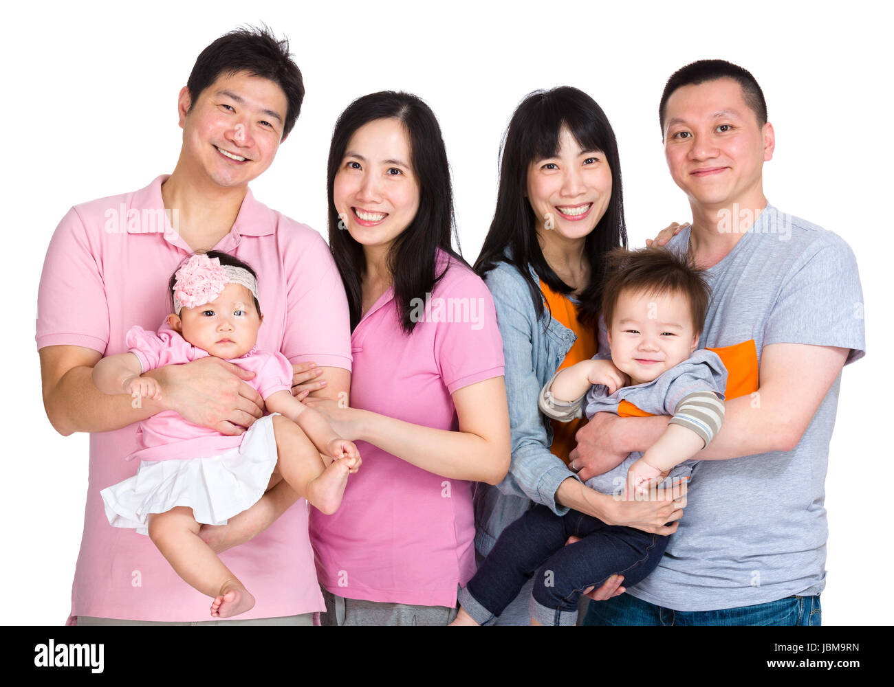 Two happy family with baby Stock Photo - Alamy