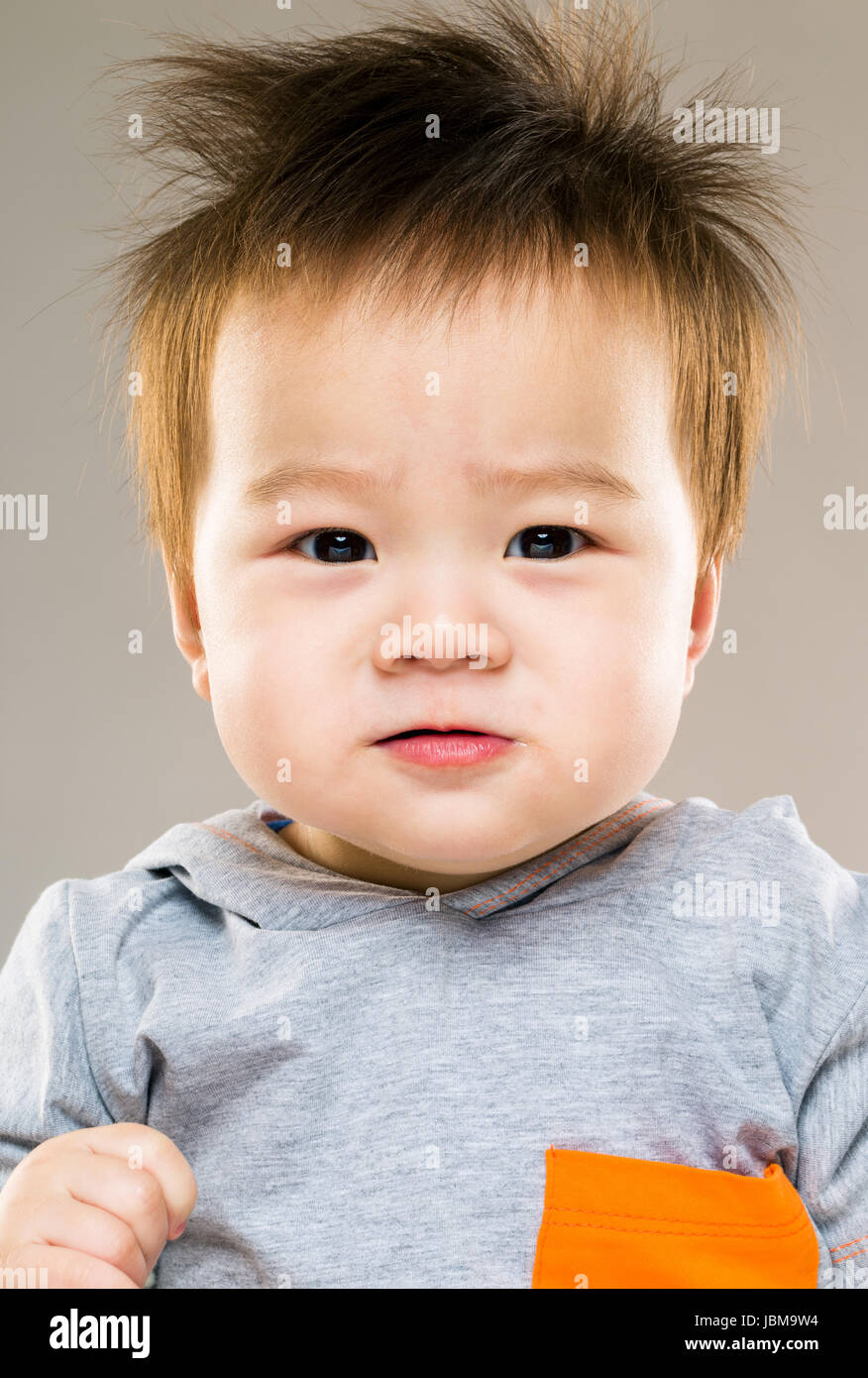 Asian serious kid Stock Photo - Alamy