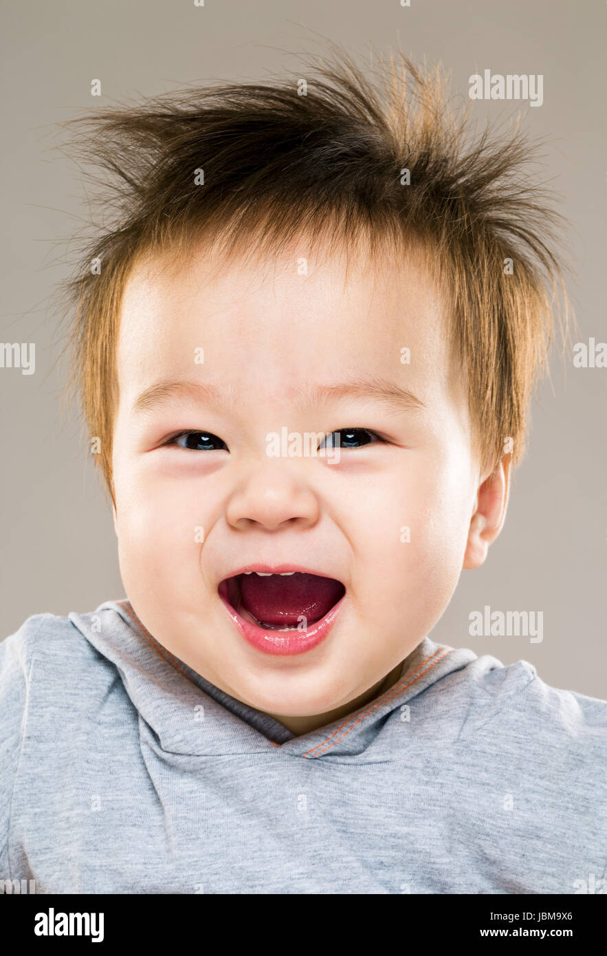 Asia baby boy excited Stock Photo - Alamy